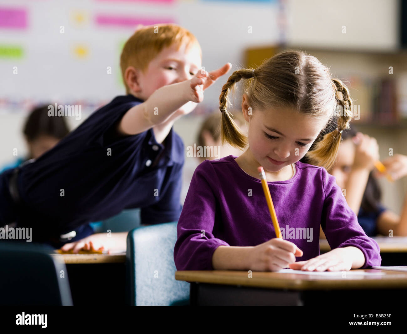 boy teasing girl Stock Photo - Alamy