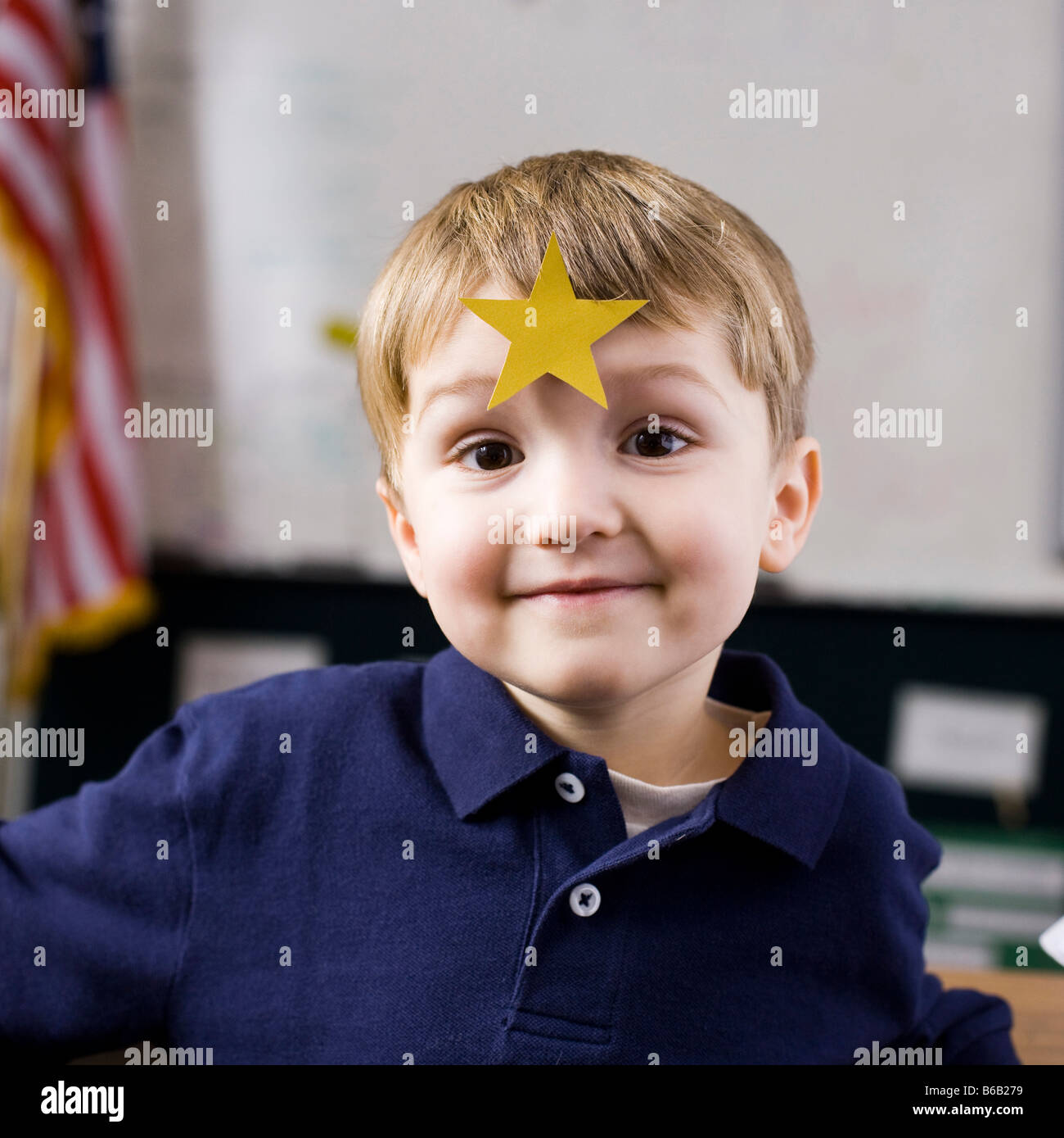 boy with gold star Stock Photo - Alamy
