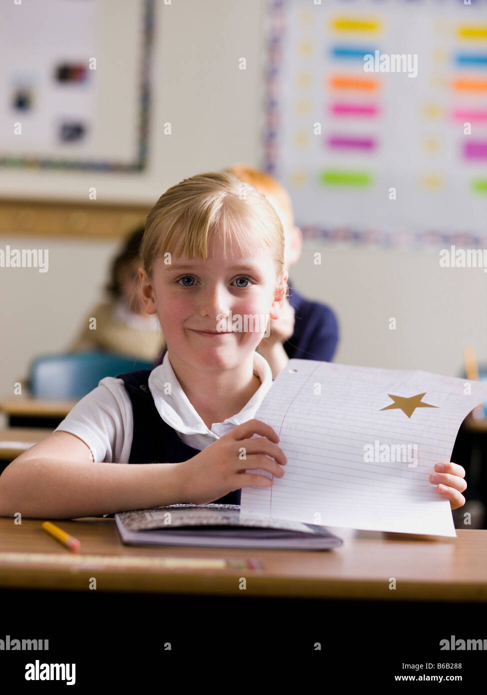 girl with gold star Stock Photo - Alamy