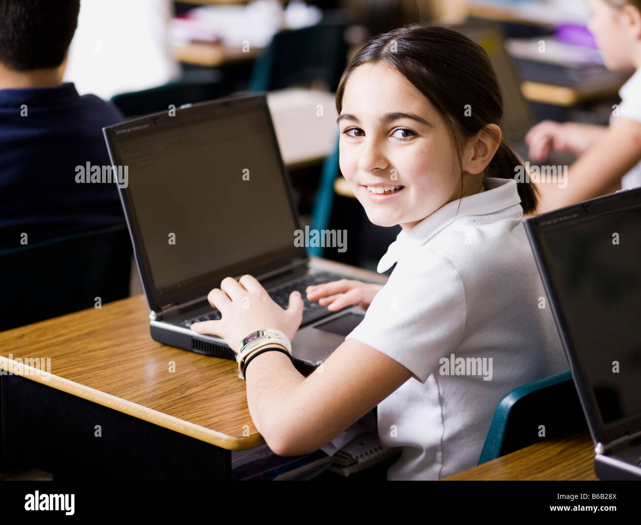 girl with laptop at school Stock Photo - Alamy