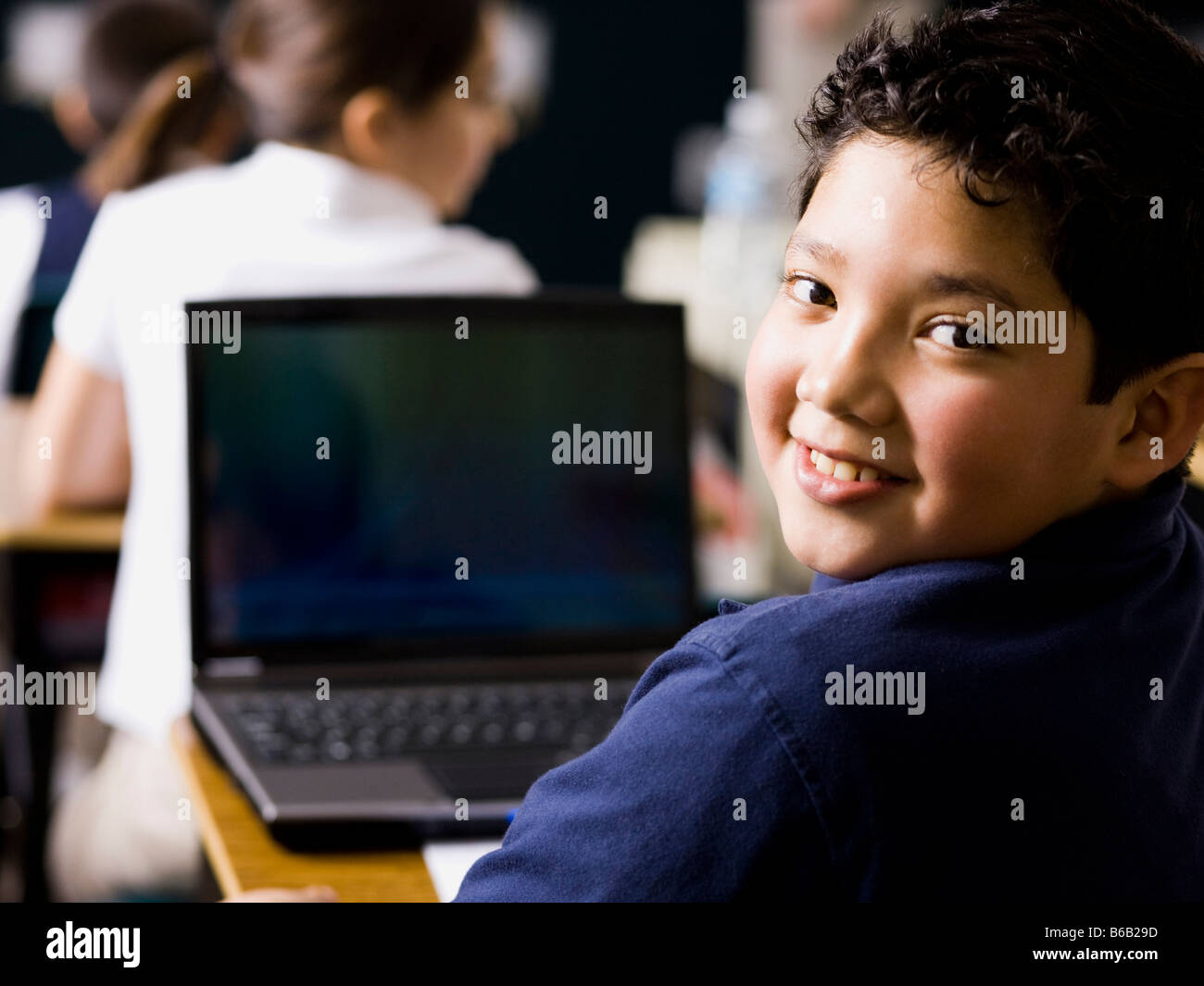 boy with laptop at school Stock Photo - Alamy