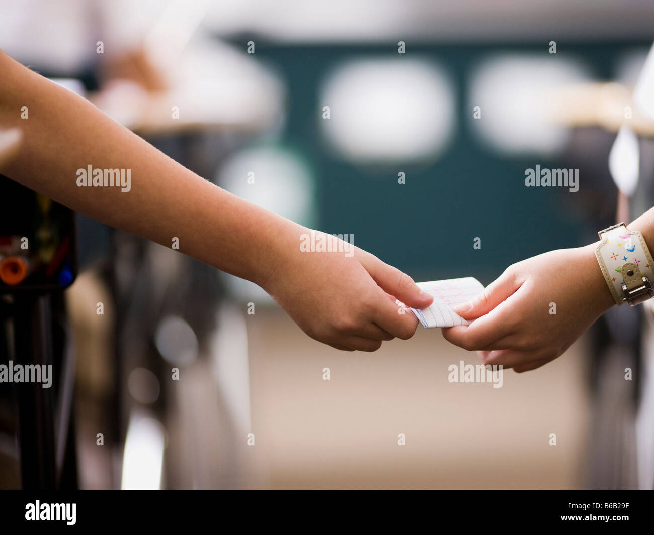 passing notes in class Stock Photo - Alamy