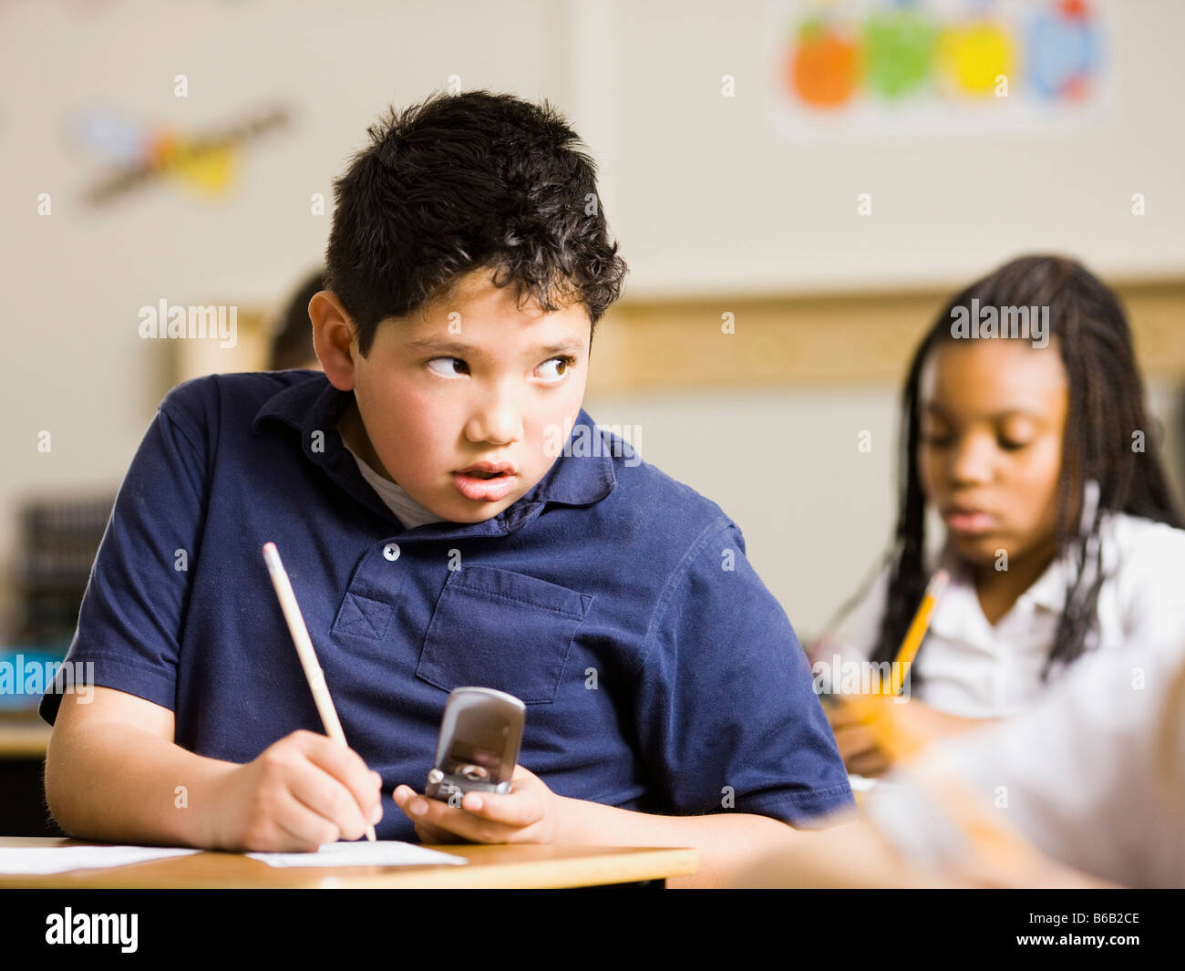 Boy cheating hi-res stock photography and images - Alamy