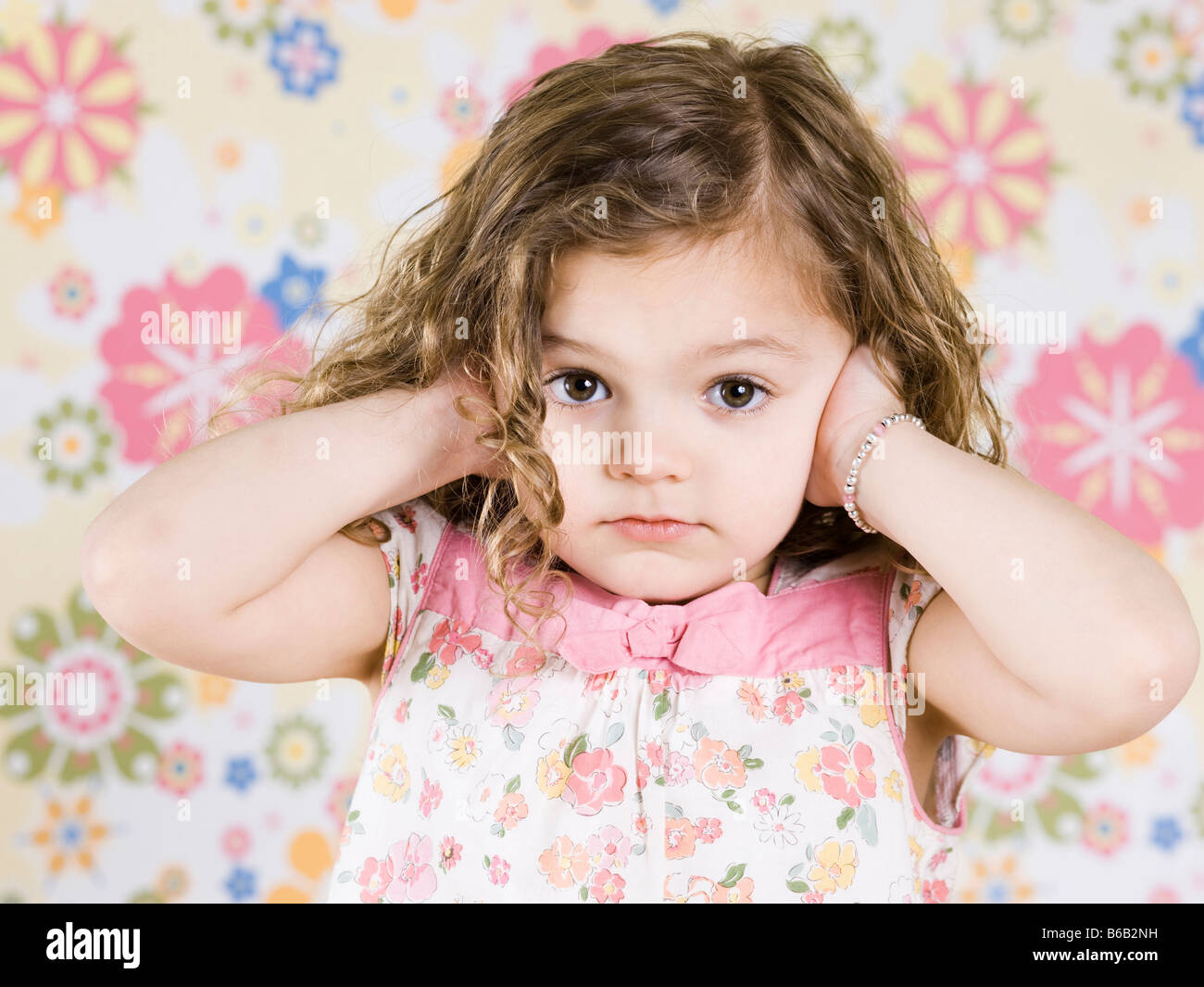 Girl Covering Ears Stock Photos & Girl Covering Ears Stock Images - Alamy