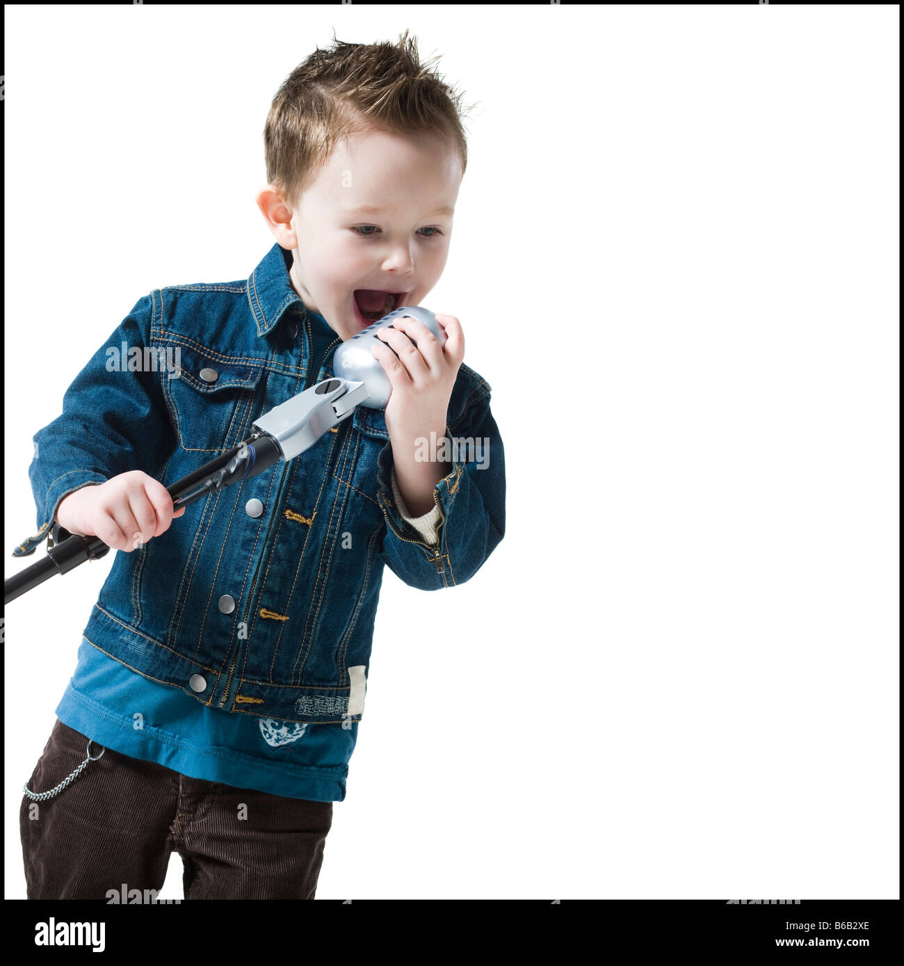 little boy singing into a microphone Stock Photo - Alamy