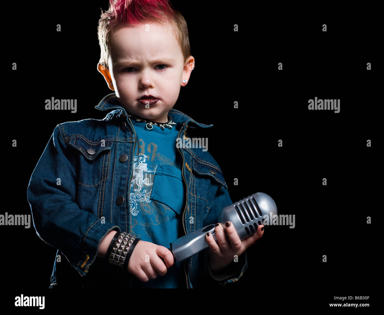 little boy singing into a microphone Stock Photo - Alamy