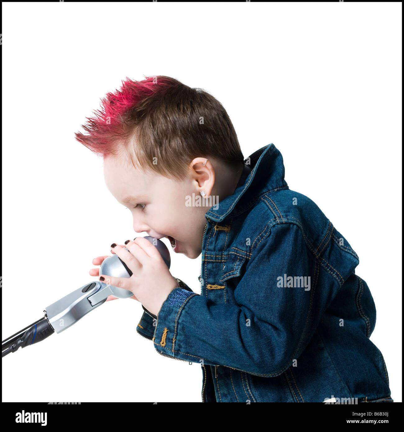 little boy singing into a microphone Stock Photo - Alamy