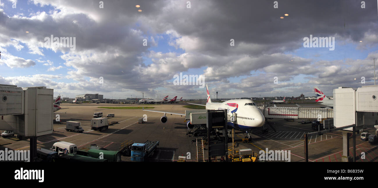 Panorama of an airport loading bay Stock Photo - Alamy