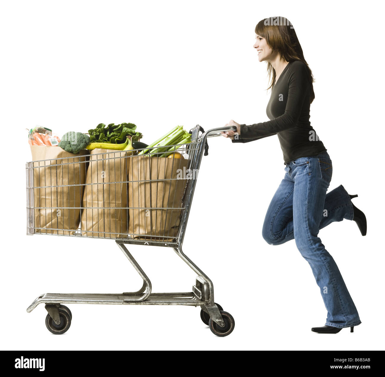 woman pushing a shopping cart Stock Photo - Alamy woman pushing a shopping cart Stock Photo - Alamy