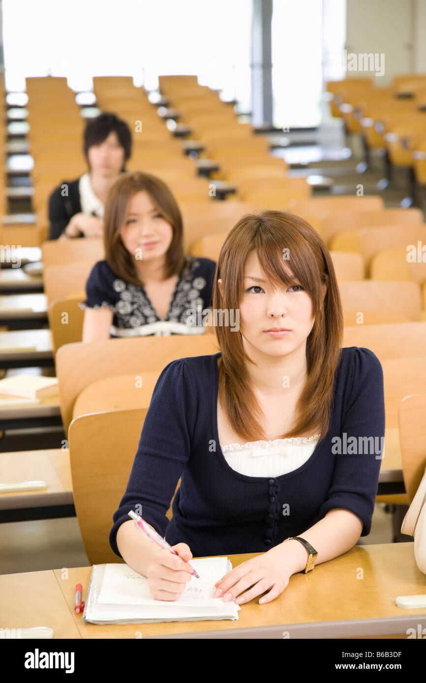 College students studying in lecture room Stock Photo - Alamy