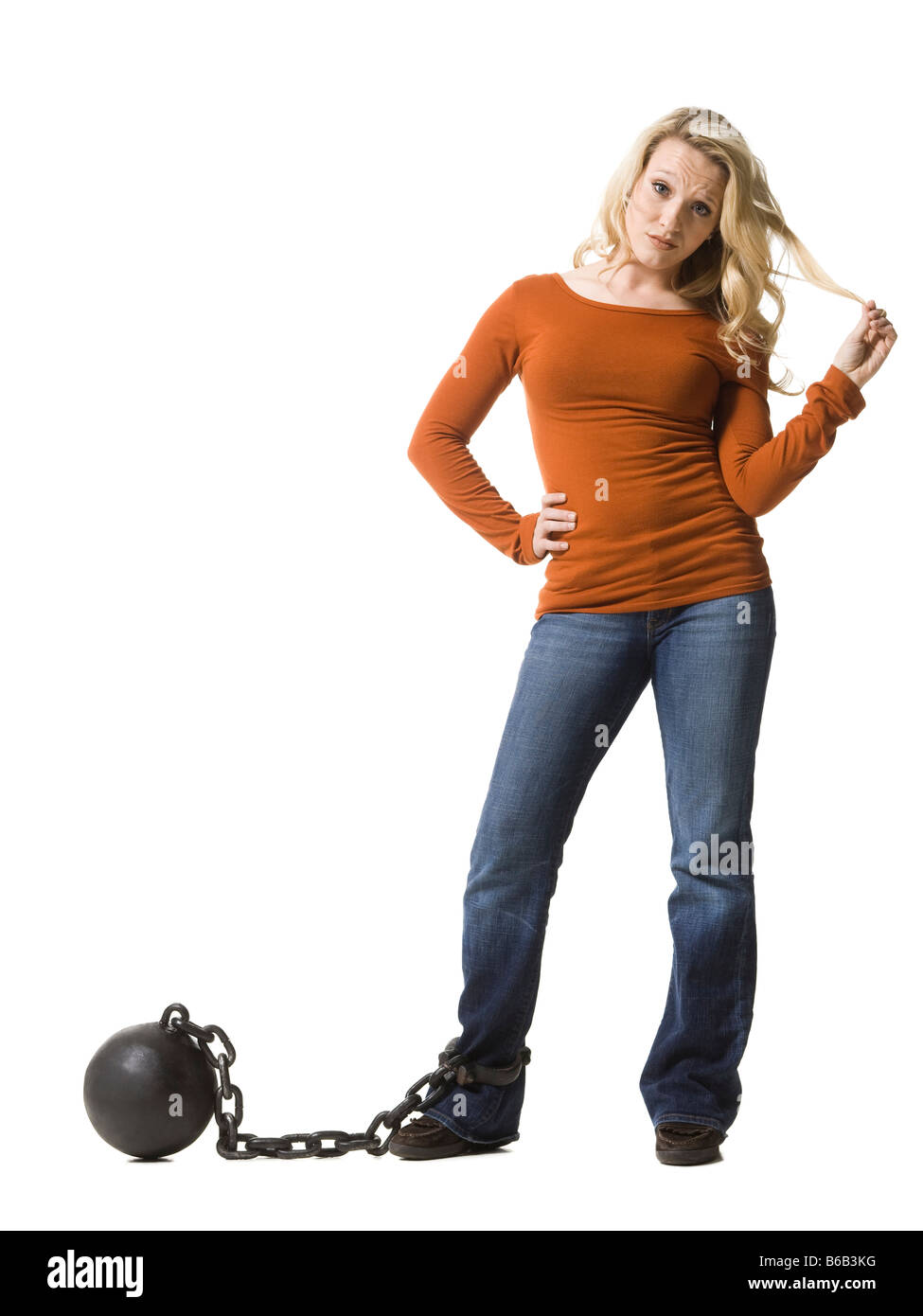 Woman prisoner chain ball hi-res stock photography and images - Alamy