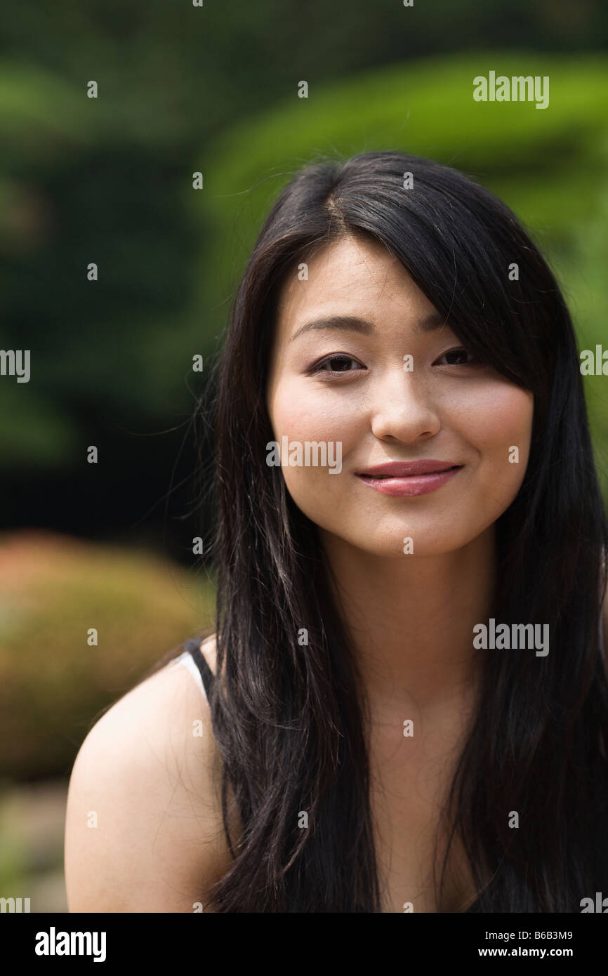 Confident Japanese woman smiling Stock Photo - Alamy