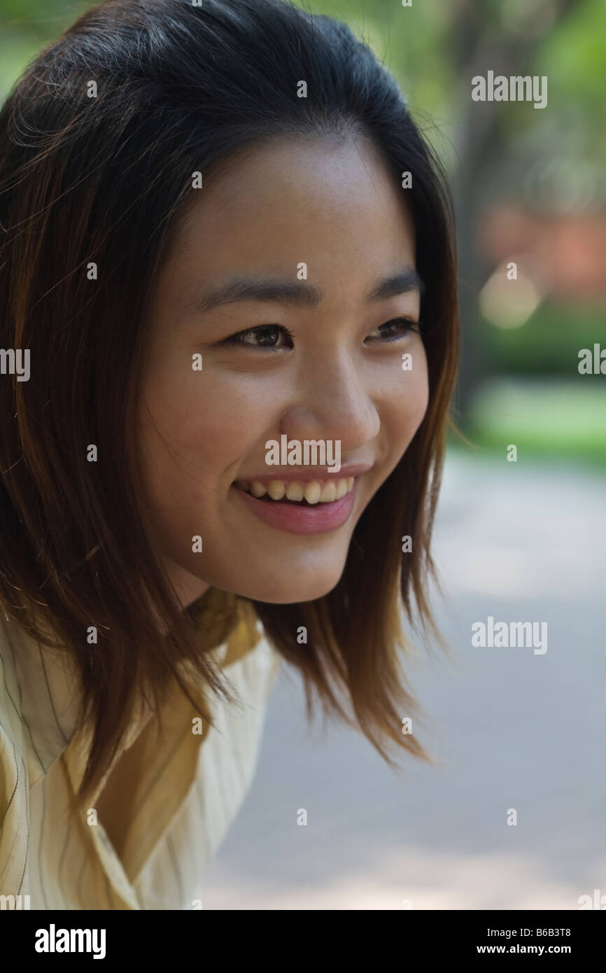 Confident Chinese woman smiling Stock Photo - Alamy