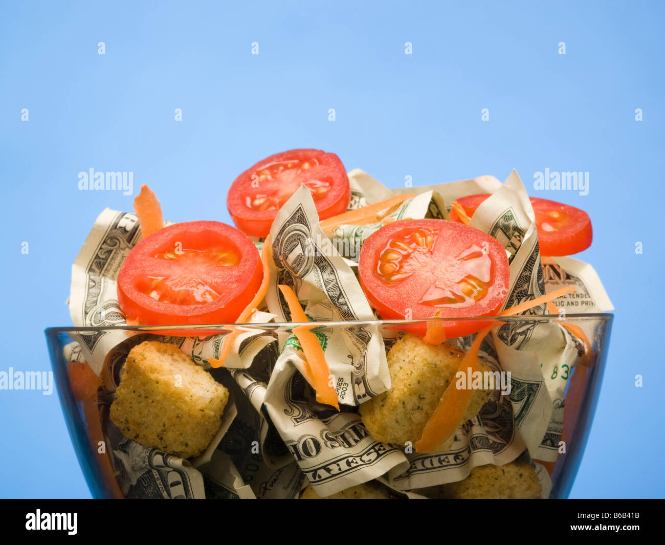 salad with dollars in it Stock Photo - Alamy