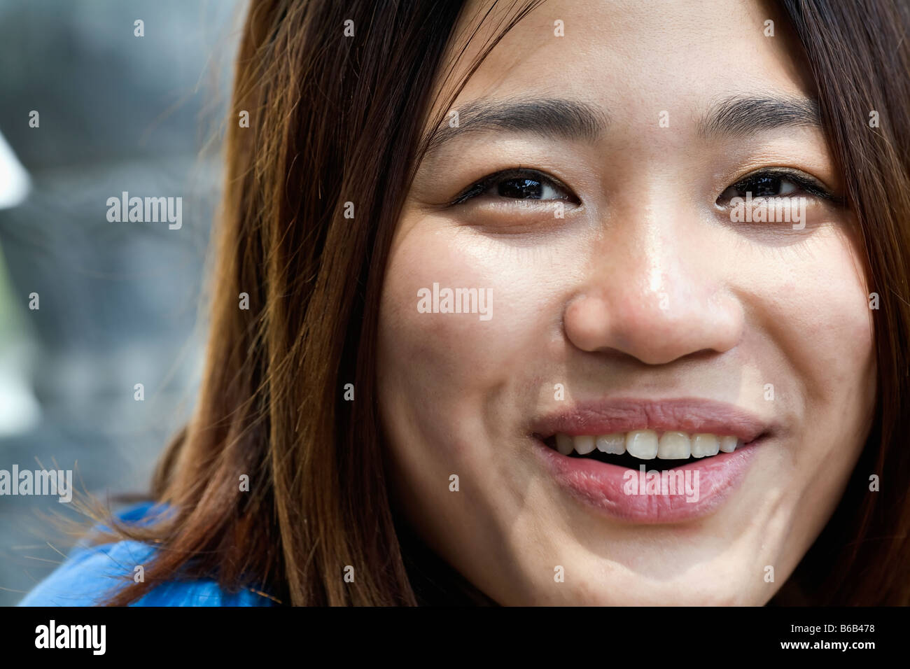 Close up of Chinese woman smiling Stock Photo - Alamy