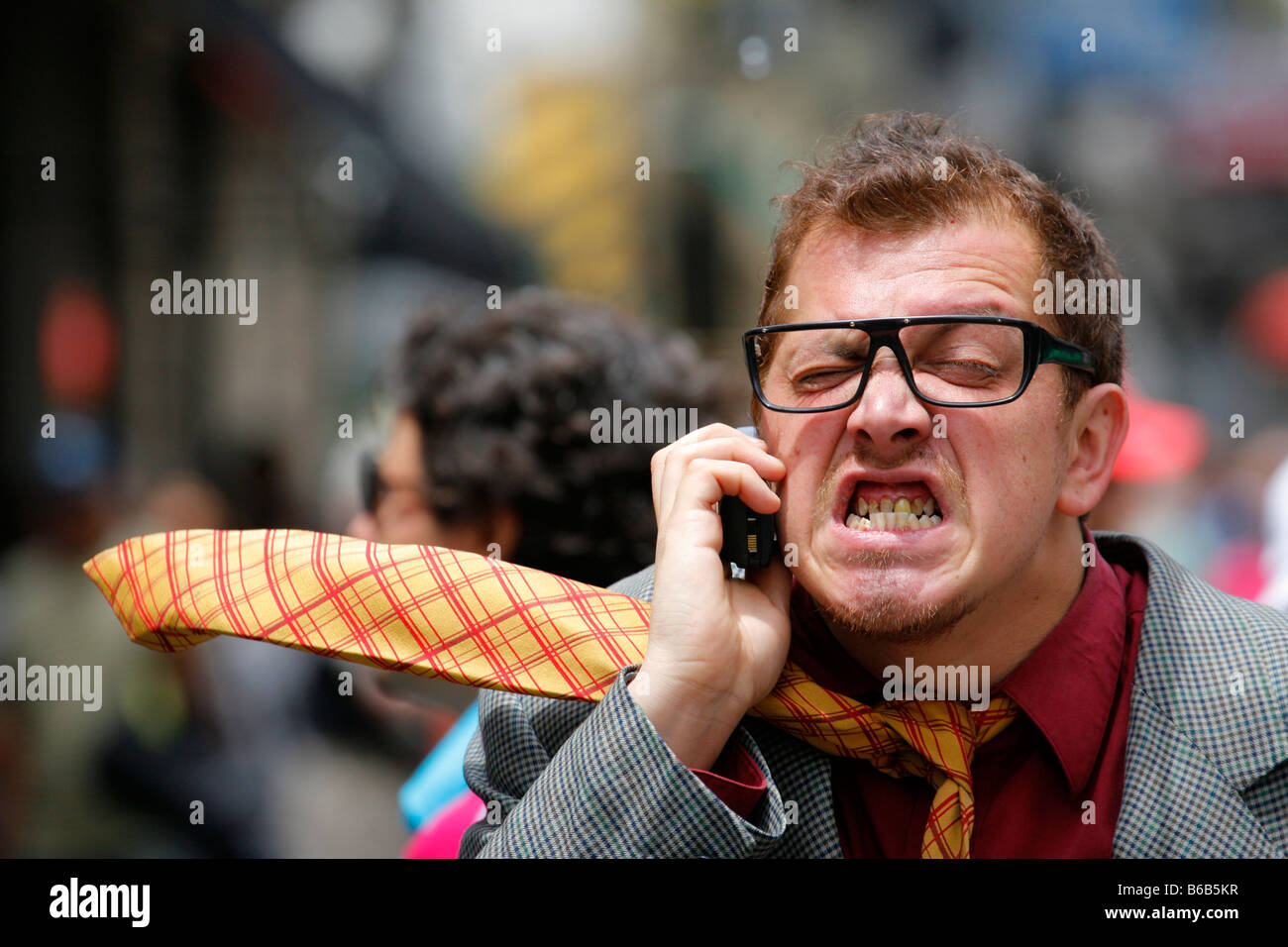 Stressed businessman running down the street Stock Photo - Alamy