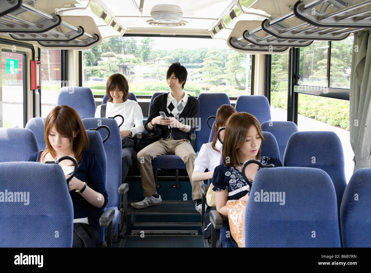 College students sitting in bus Stock Photo - Alamy