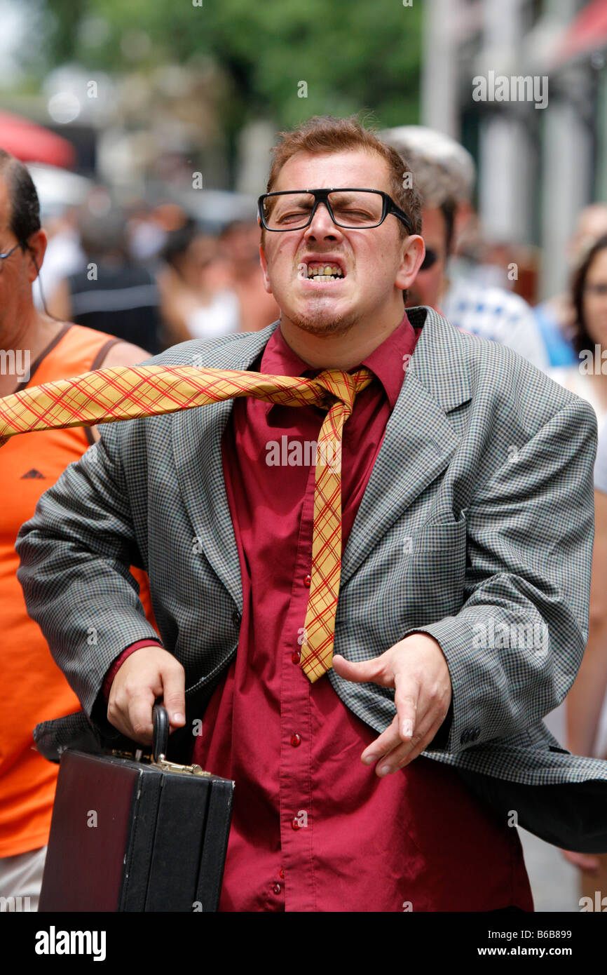 Stressed businessman running down the street Stock Photo - Alamy