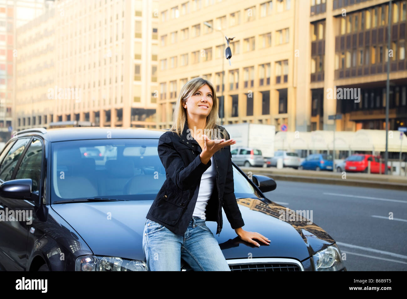 Female throwing keys hi-res stock photography and images - Alamy