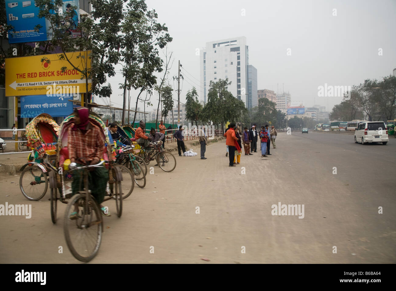 Men in rickshaws dhaka hi-res stock photography and images - Alamy