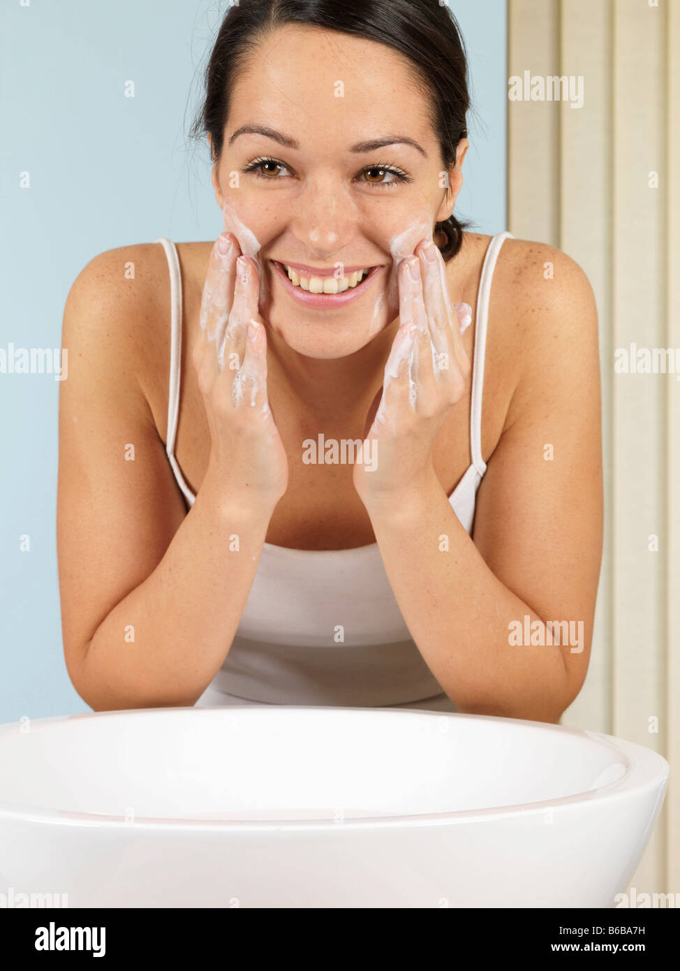 Washing face with soap Cut Out Stock Images & Pictures - Alamy