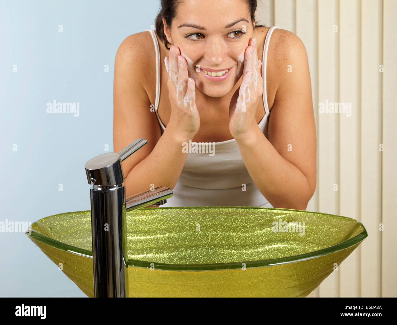 Young Woman Washing Face Model Released Stock Photo - Alamy