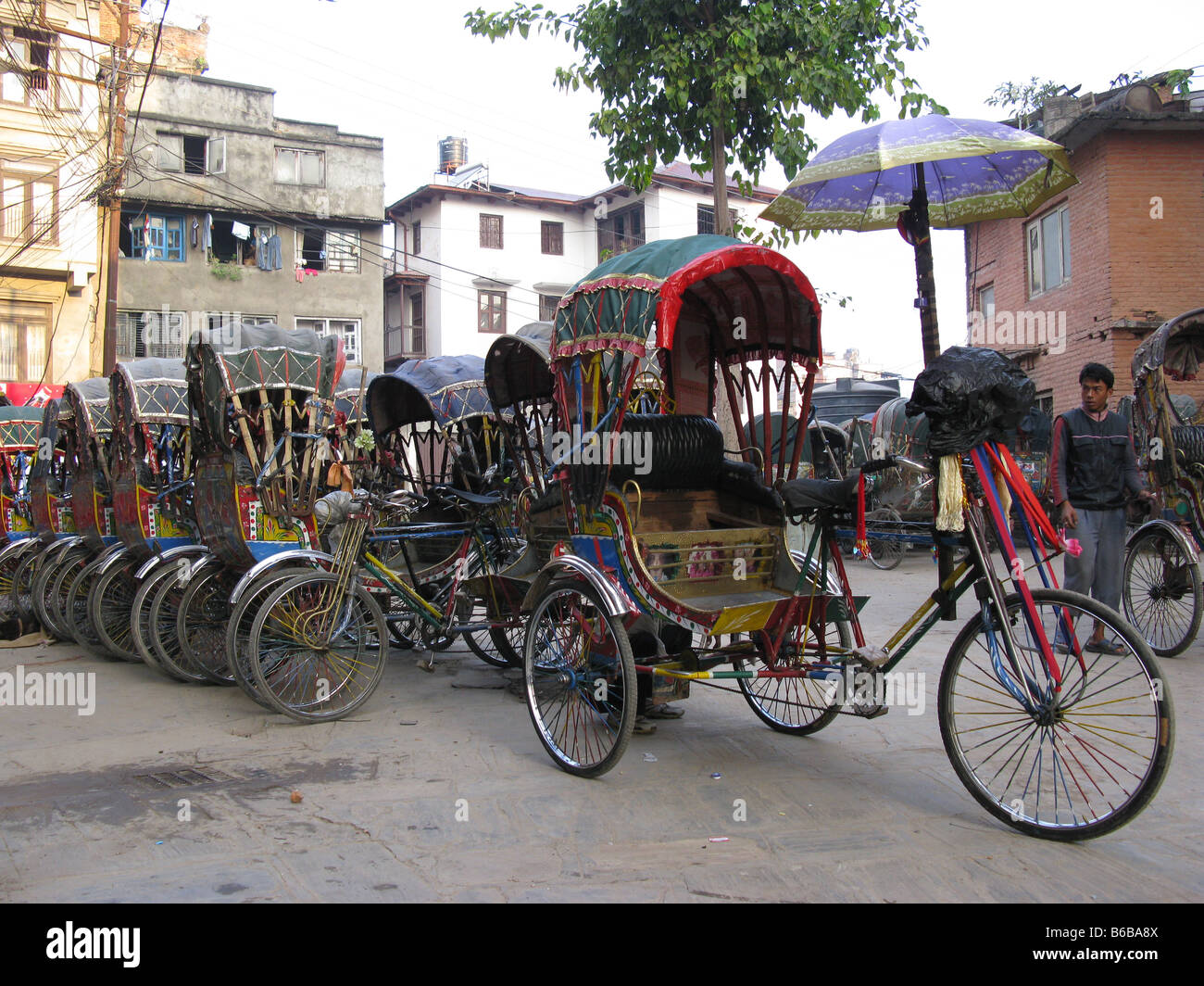 Rickshaws still parked before the start of a busy day, Chhetrapati area ...