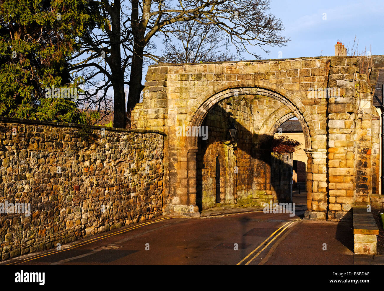 Modern roadway through medieval gateway in Hexham Stock Photo - Alamy