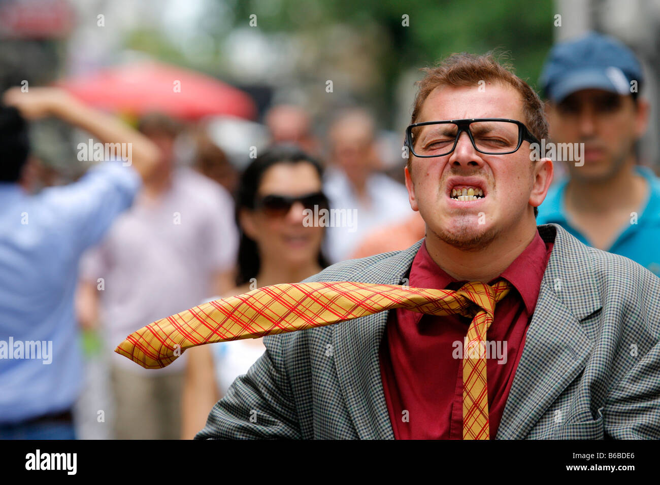 Stressed businessman running down the street Stock Photo - Alamy