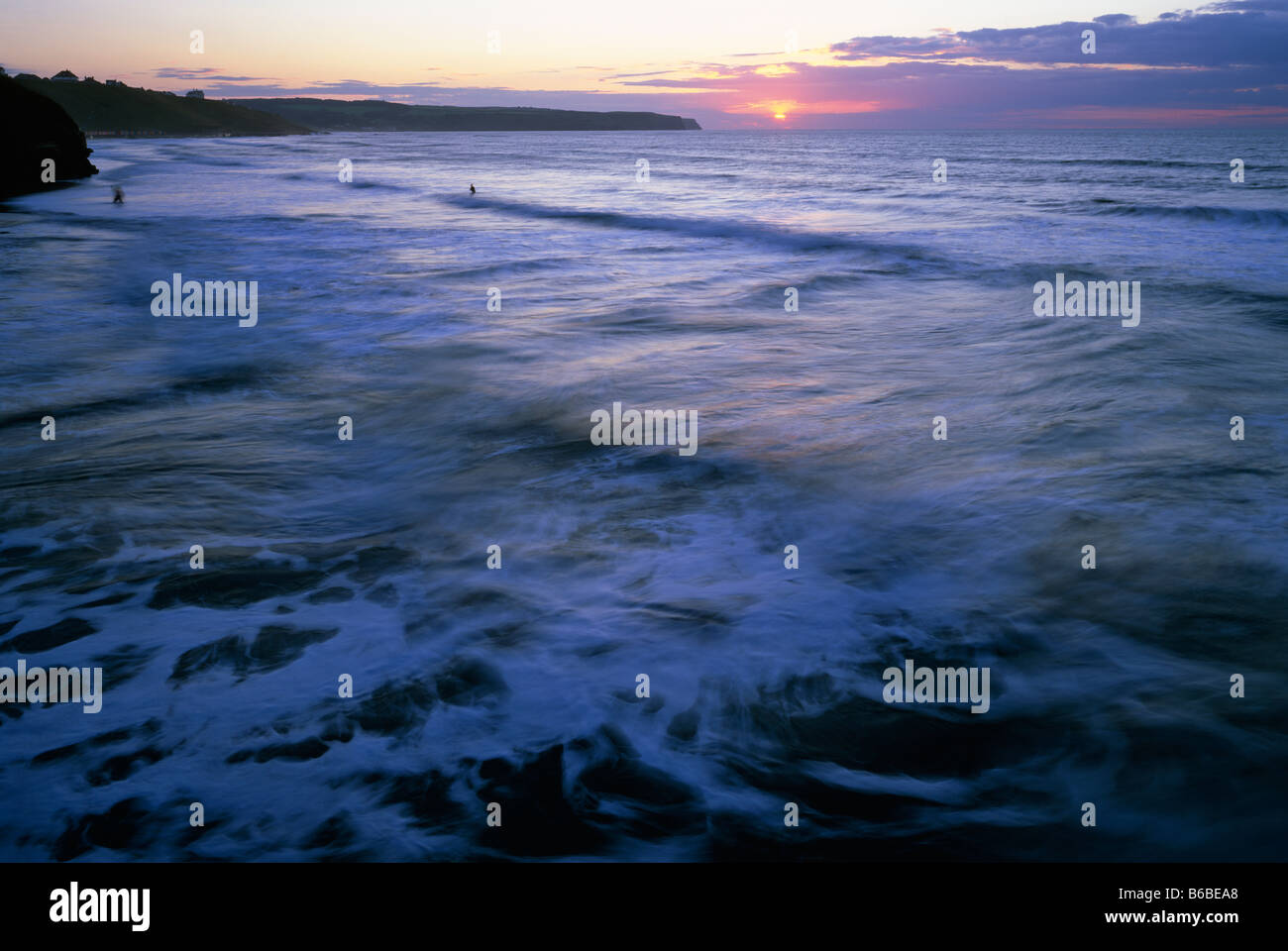 Sunset over Whitby beach, Whitby North Yorkshire Stock Photo - Alamy