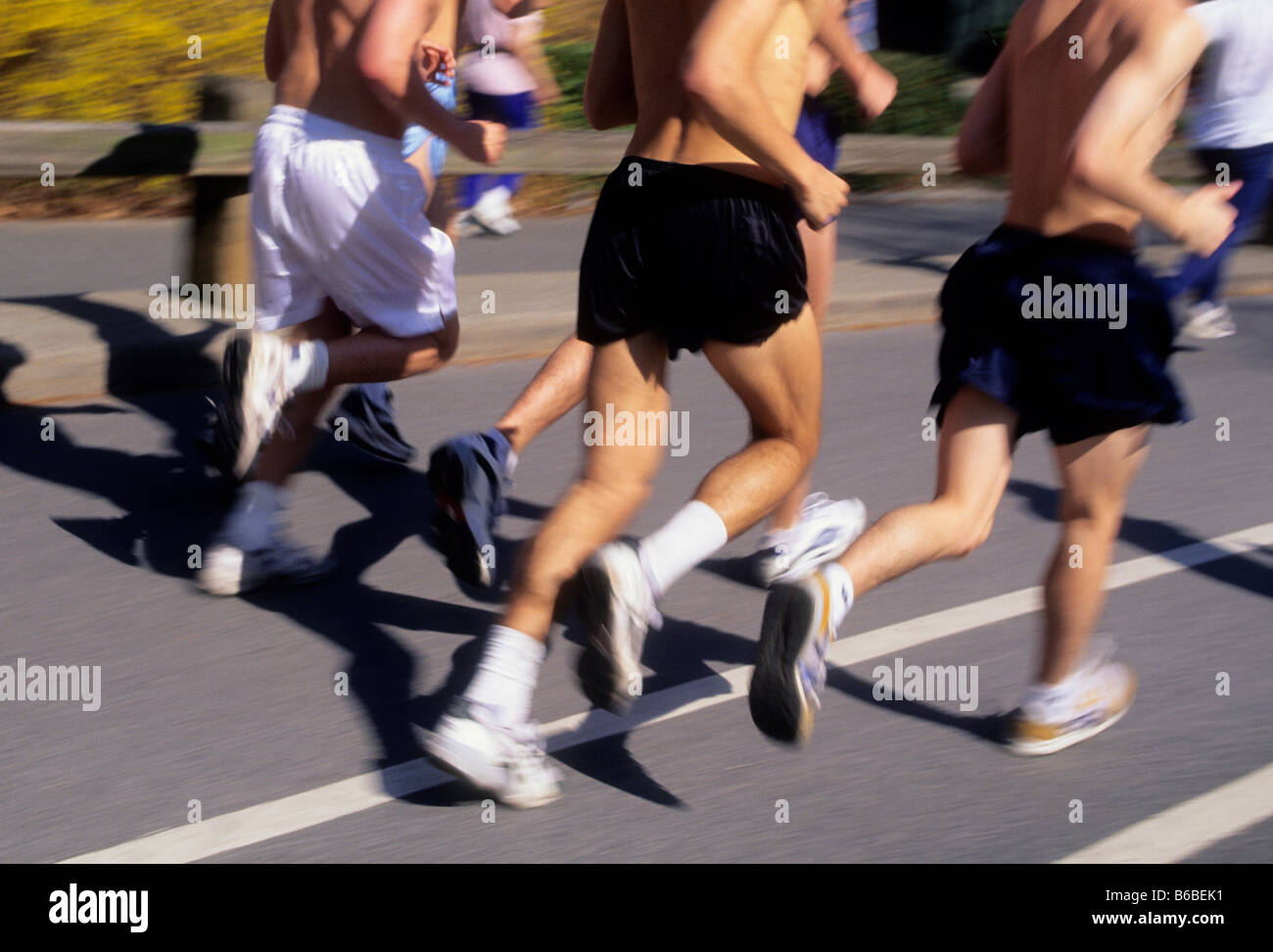 New York City Central Park joggers. Low section of a group of people ...