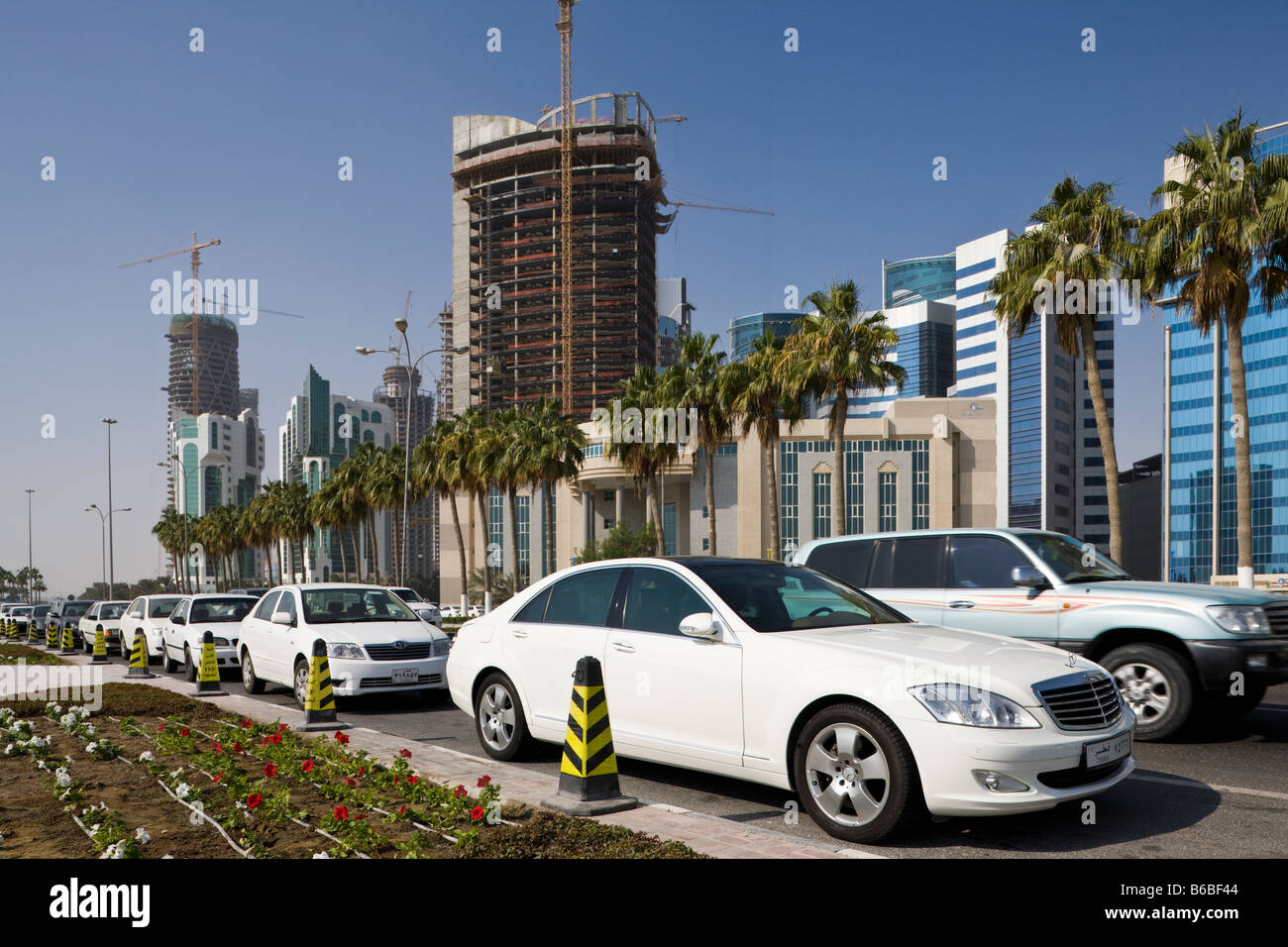 traffic and construction of highrise buildings in Doha, Qatar Stock ...