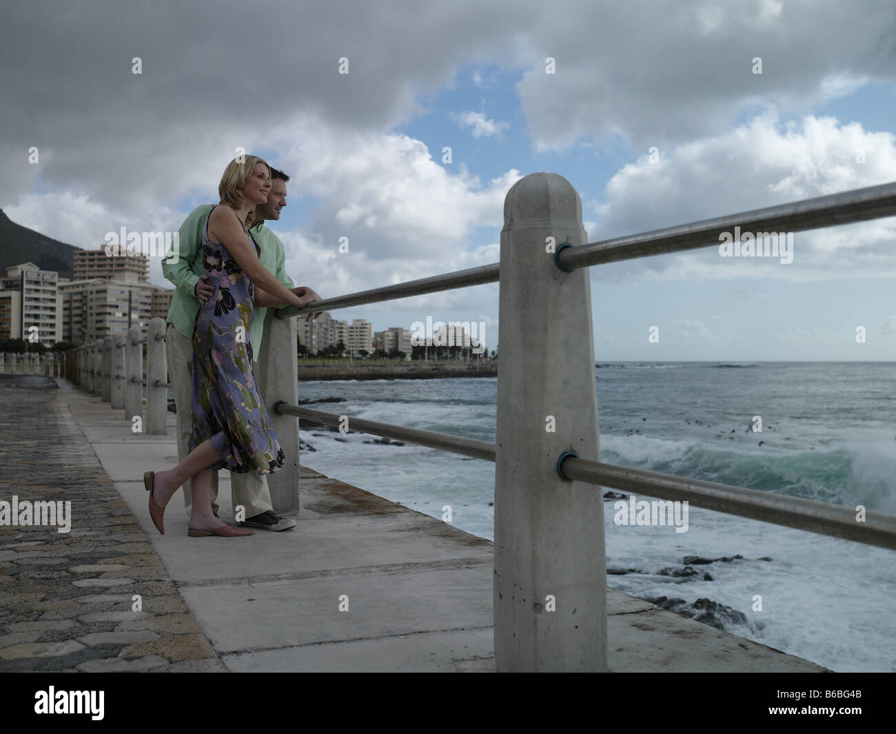 Man leaning on hand rail hi-res stock photography and images - Alamy