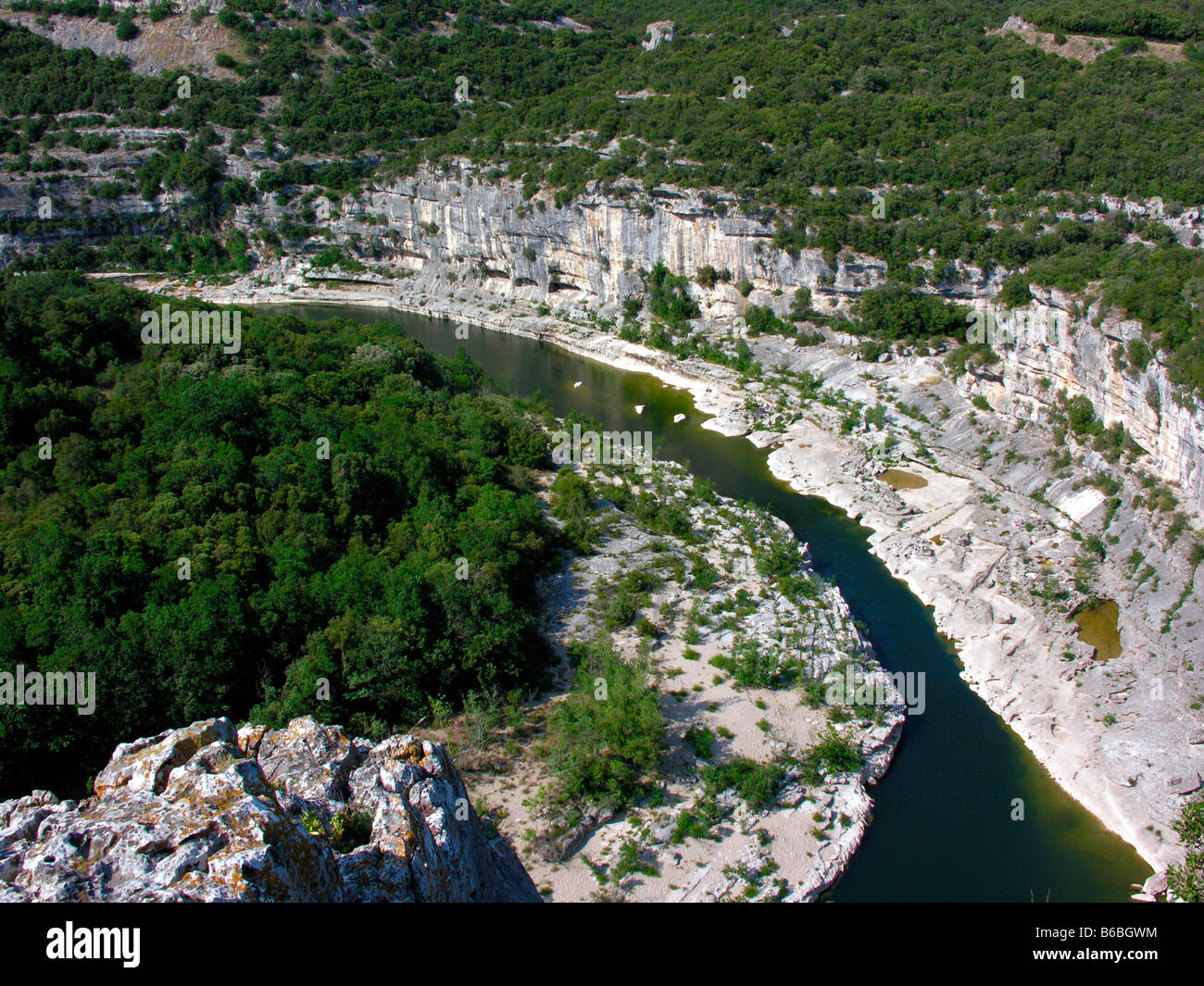 Scenic river shot through forest hi-res stock photography and images ...