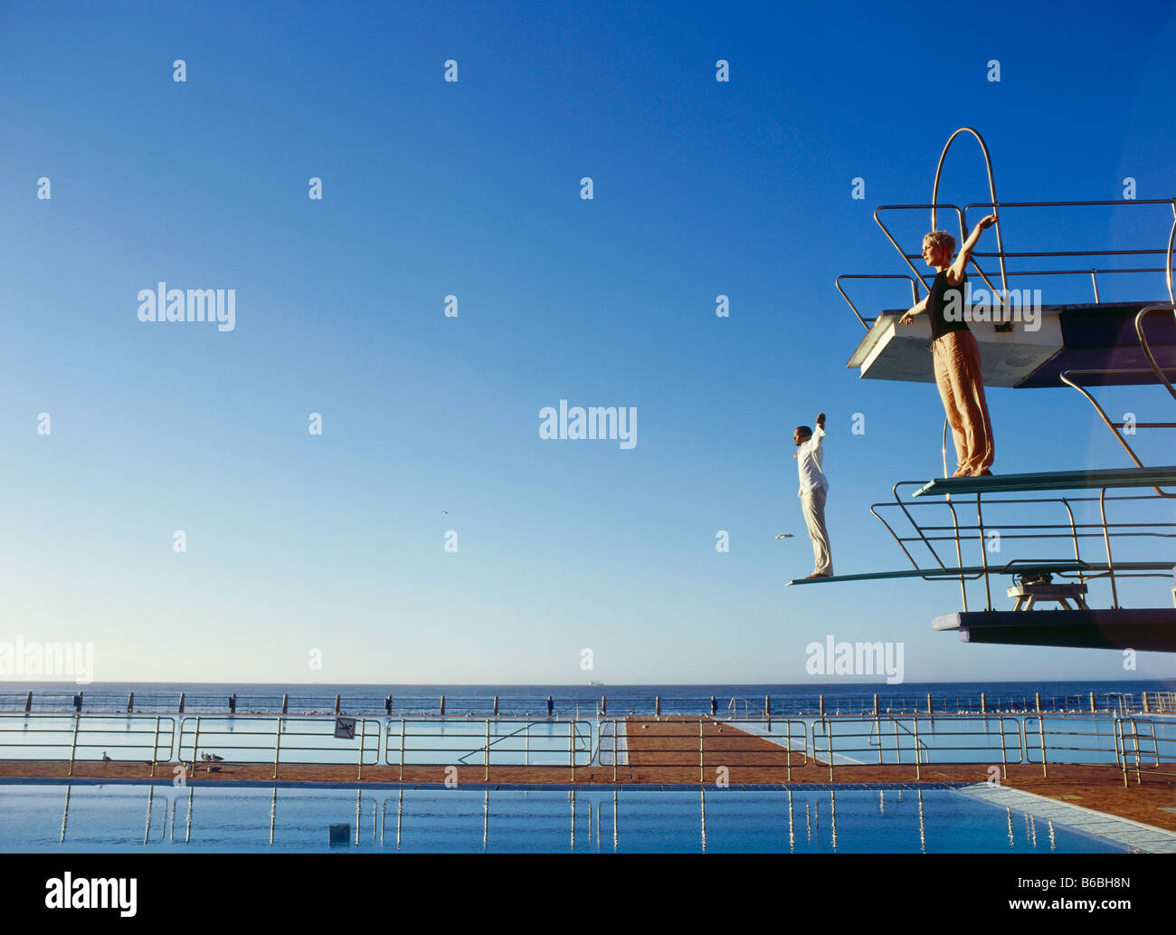 Woman on diving board hi-res stock photography and images - Alamy