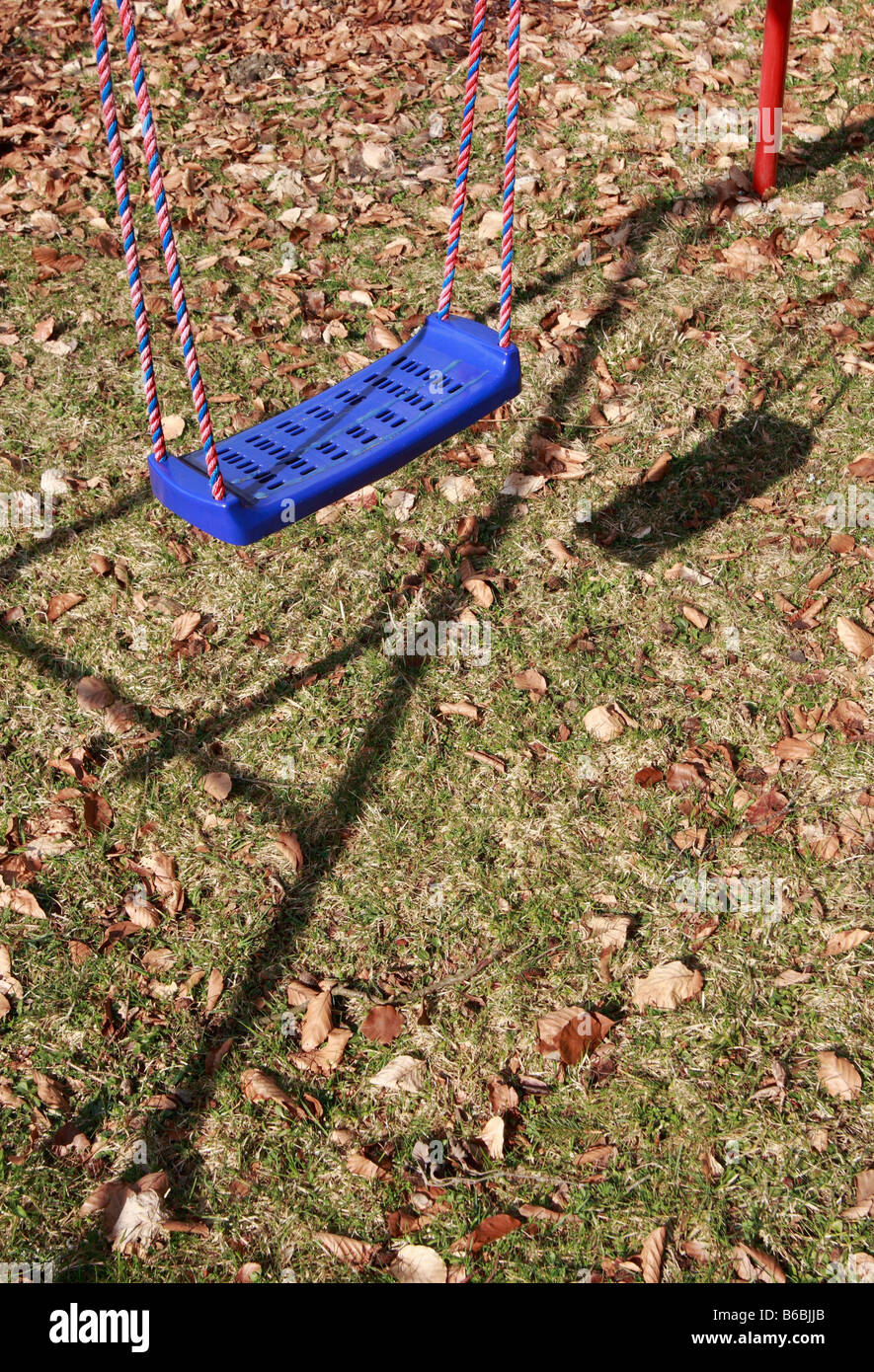 Rope swing in field Stock Photo - Alamy