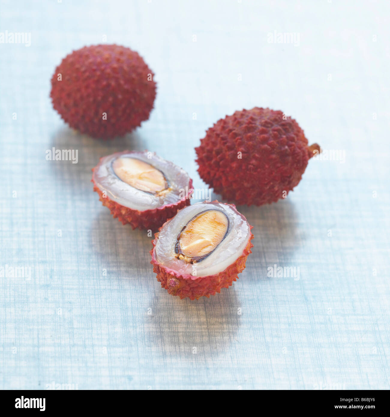 Close-up of lychee on table Stock Photo - Alamy