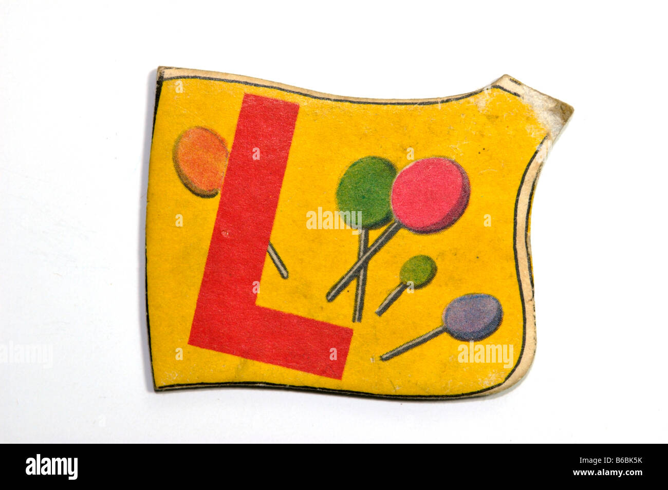 Vintage alphabet letter puzzle piece for children with the letter L and ...