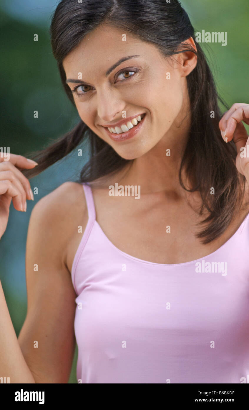 Portrait of woman smiling Stock Photo - Alamy