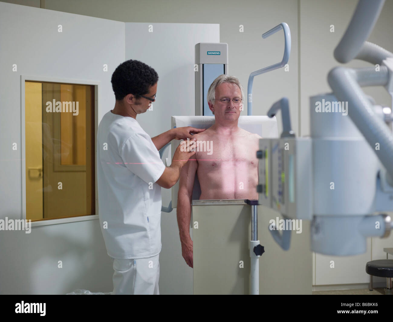 Patient having x-ray examination Stock Photo - Alamy