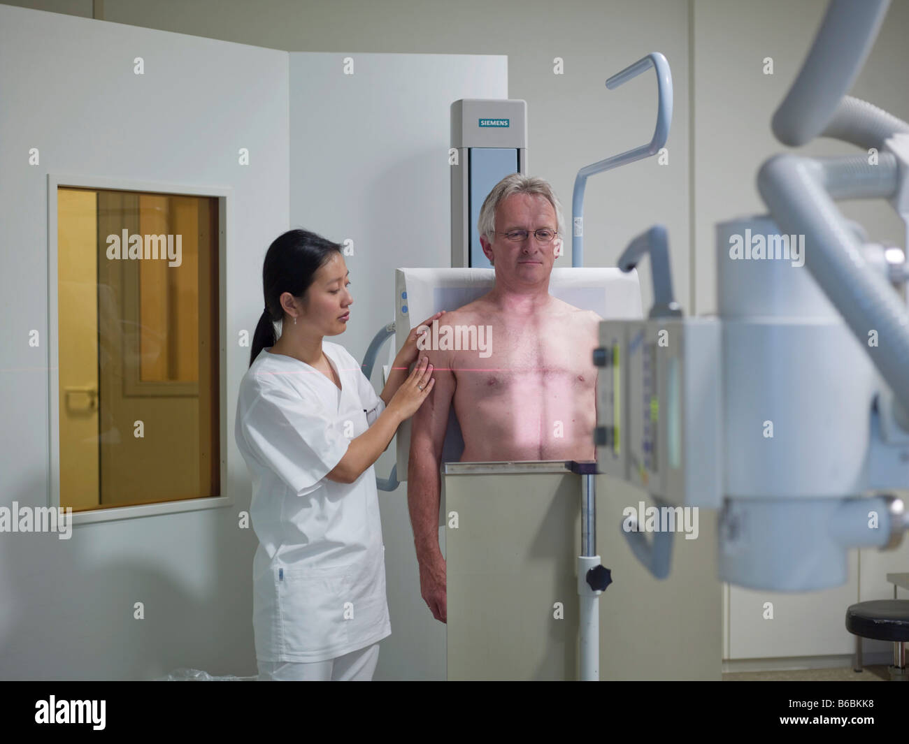 Patient having x-ray examination Stock Photo - Alamy