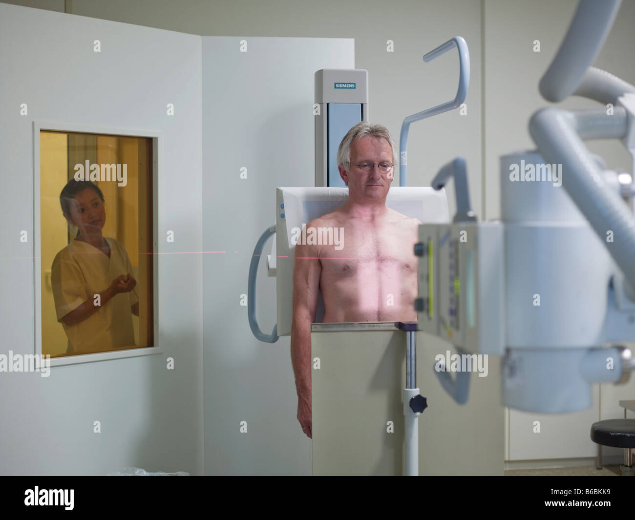 Patient having x-ray examination Stock Photo - Alamy