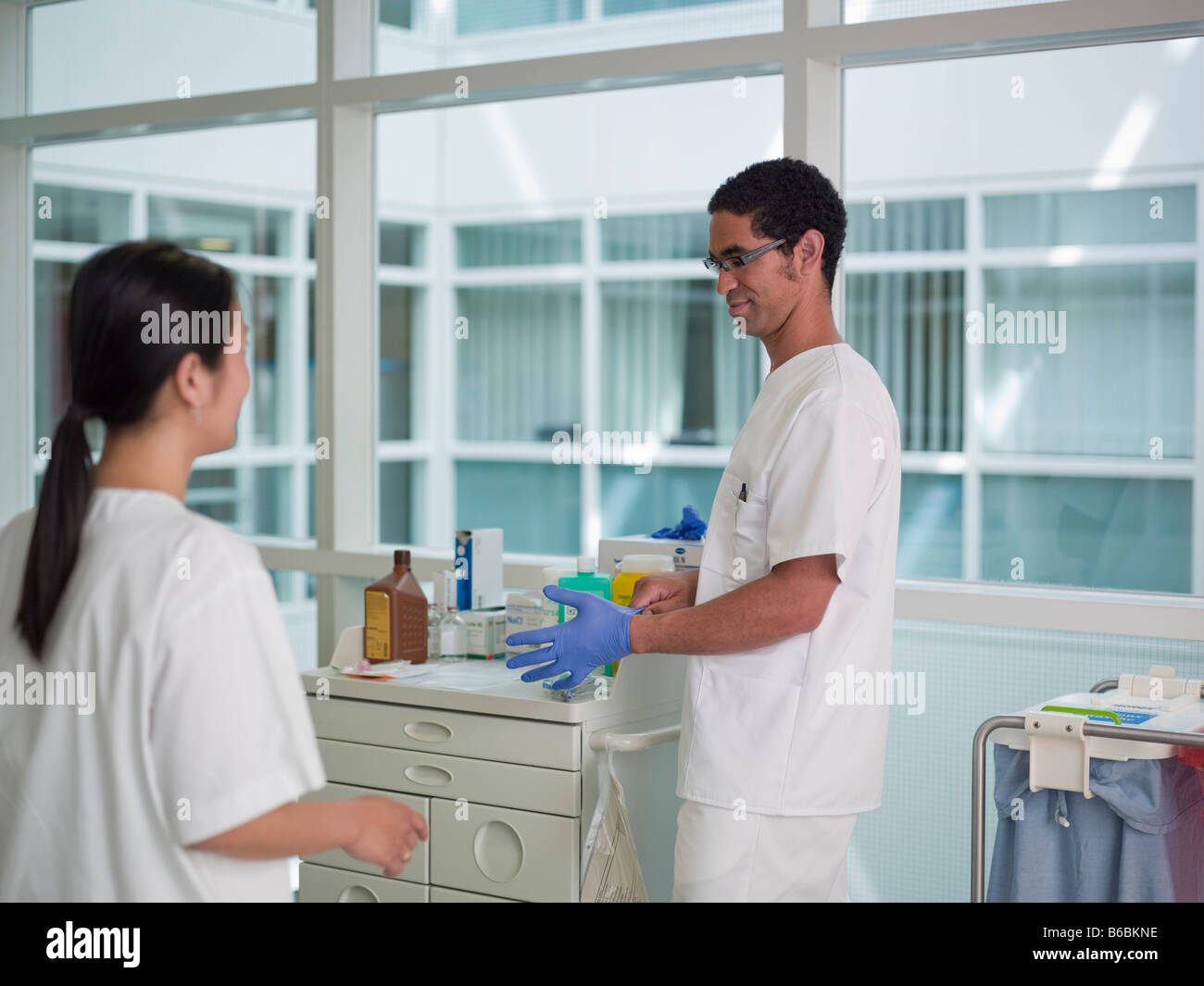 Lab technicians working in lab Stock Photo - Alamy