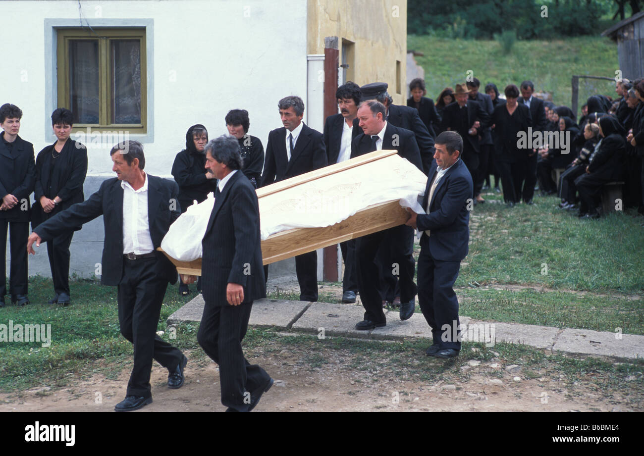 The funeral service of Gizella Kocisis aged 89 in the garden of her ...