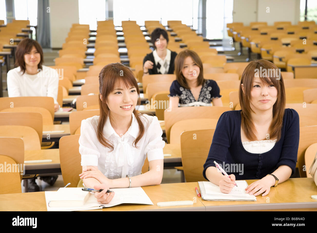 College students studying in lecture room Stock Photo - Alamy