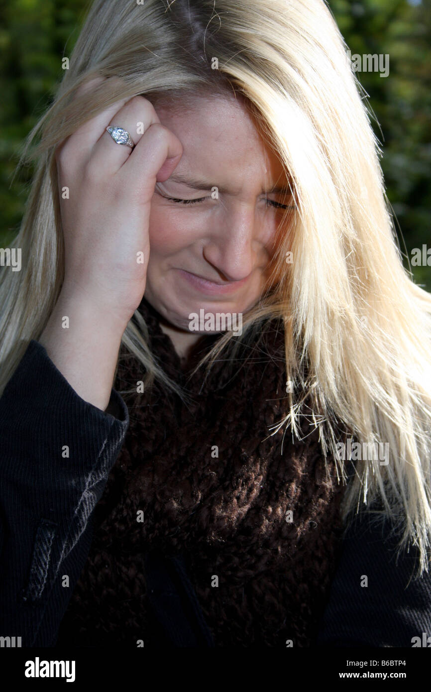 An English teenage girl crying Stock Photo - Alamy