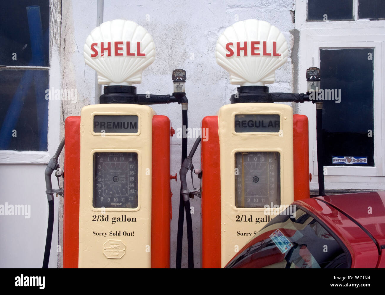 Old Shell petrol pumps at a redundant petrol station in St.Mawes ...