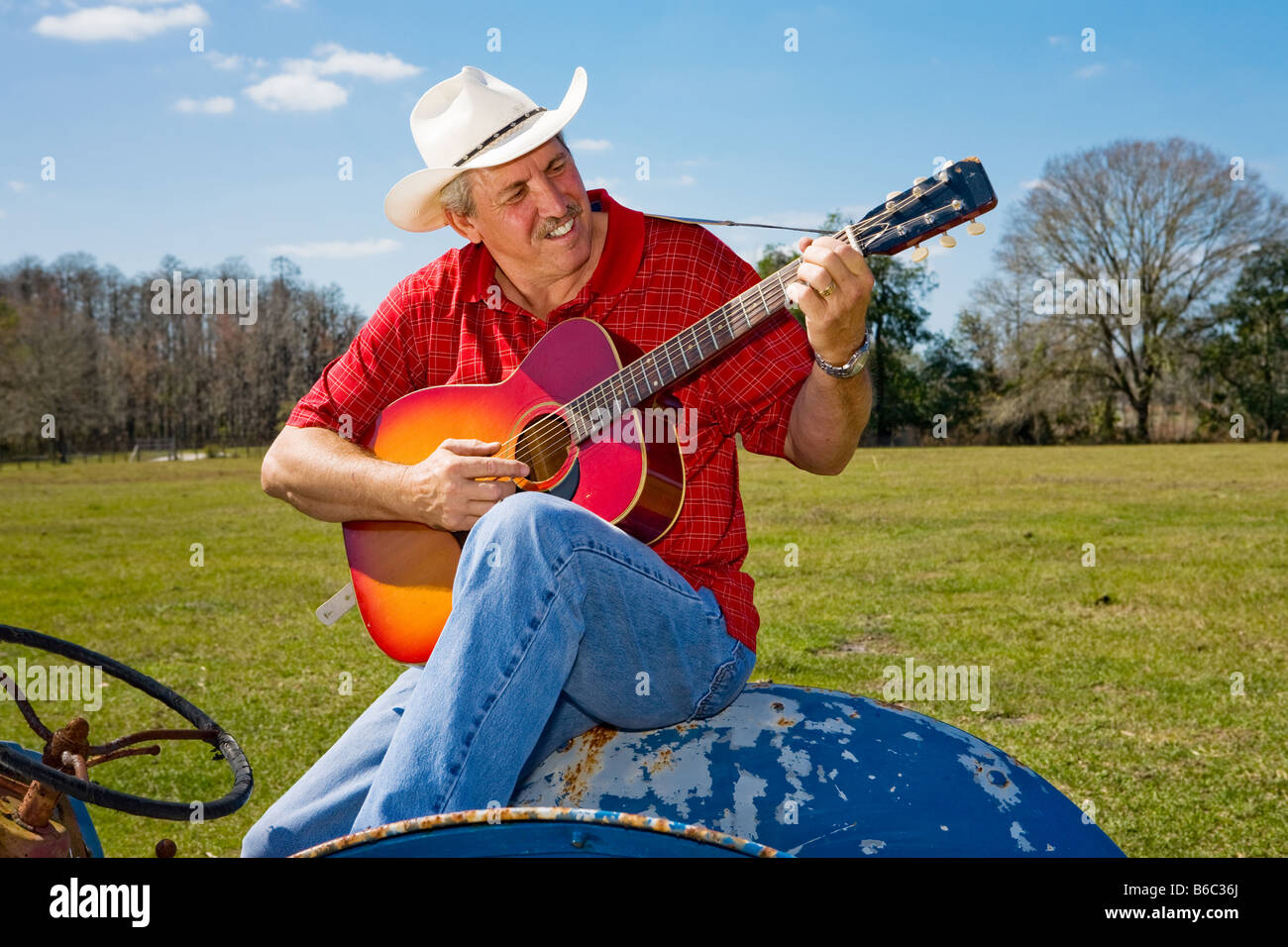 Singing cowboy with guitar hi-res stock photography and images - Alamy