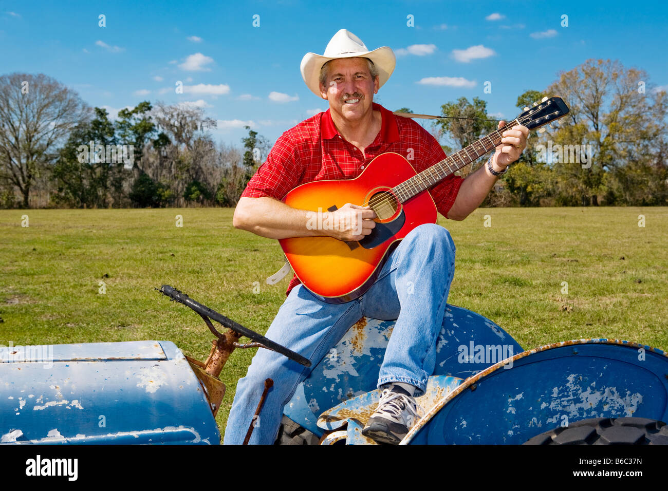 Cowboy man tractor portrait western hi-res stock photography and images ...