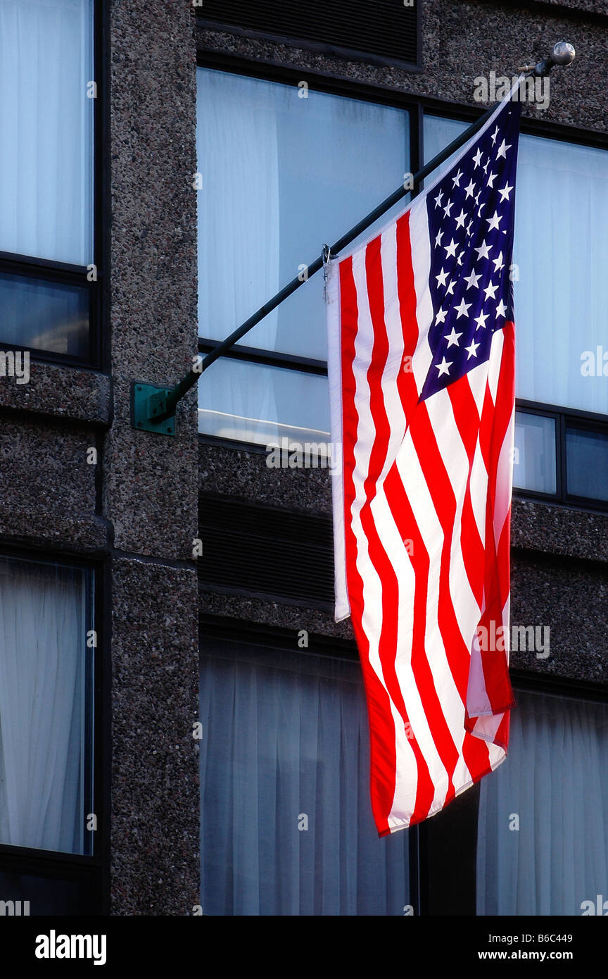 Backlit iconic American Flag on a flag pole Stock Photo - Alamy
